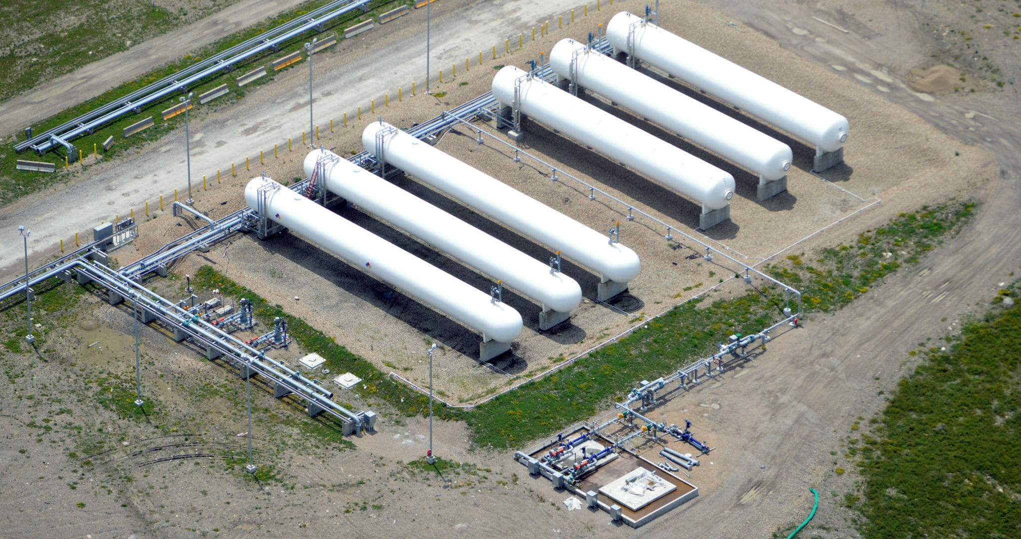 Added NGL Storage & Metering Skids - Kokosing